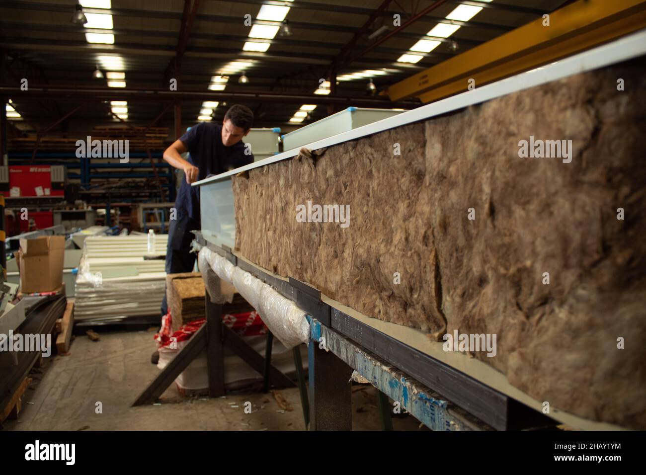 Craftsman rivet metal in the workshop Stock Photo - Alamy