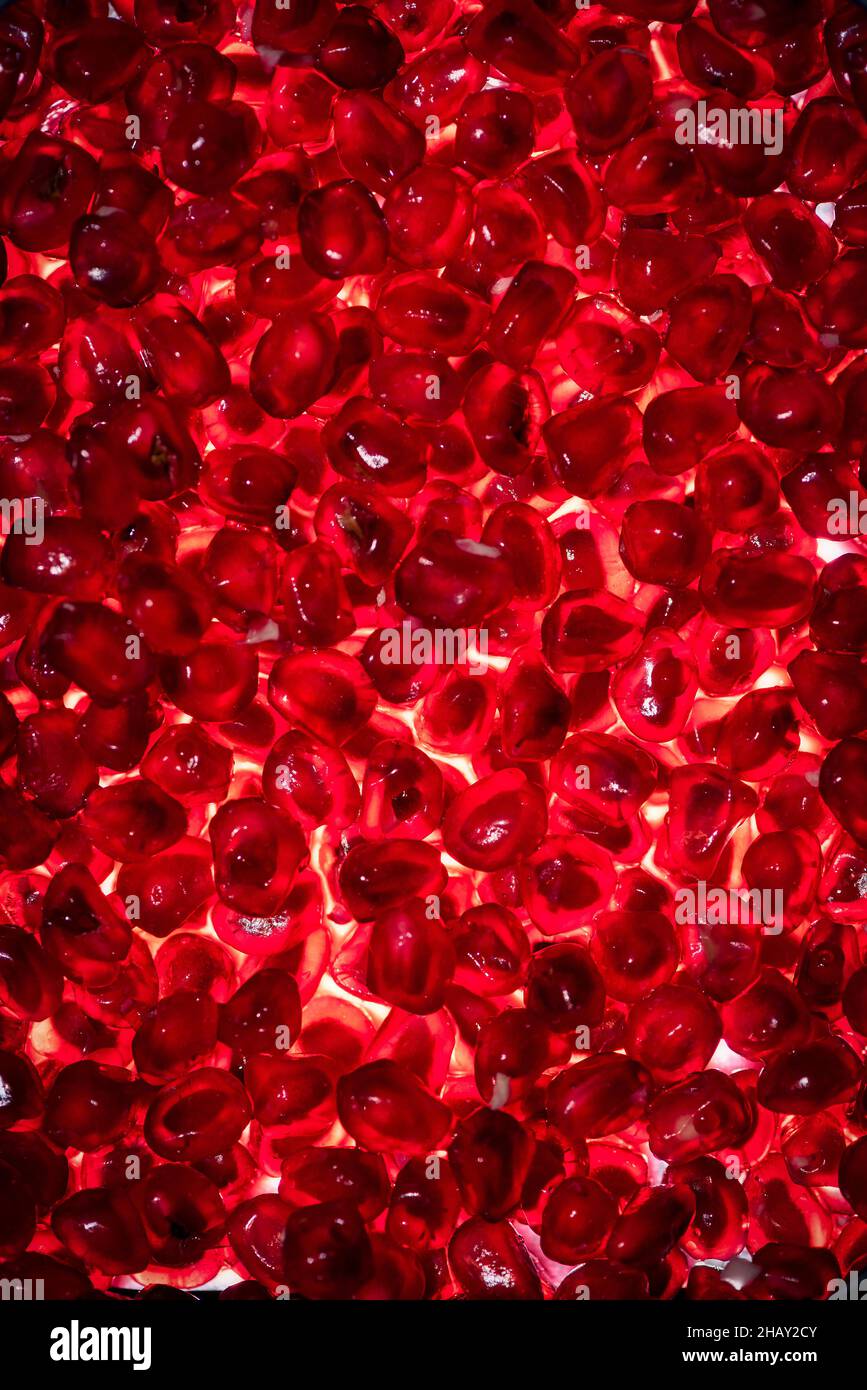 From above of full frame closeup background of shiny red ripe ...