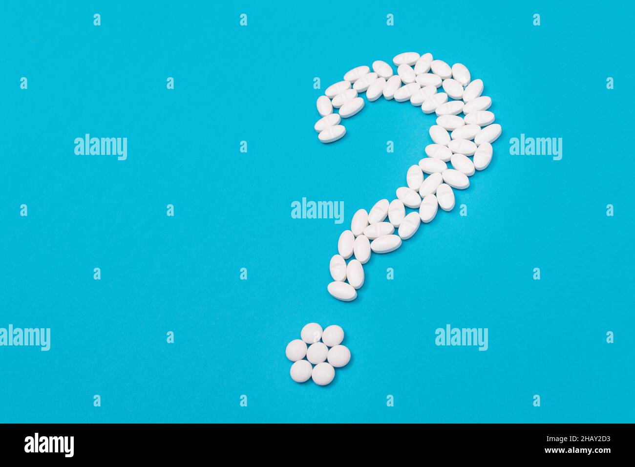 Question Mark Made from White Pills and Tablets, Lying on Blue ...