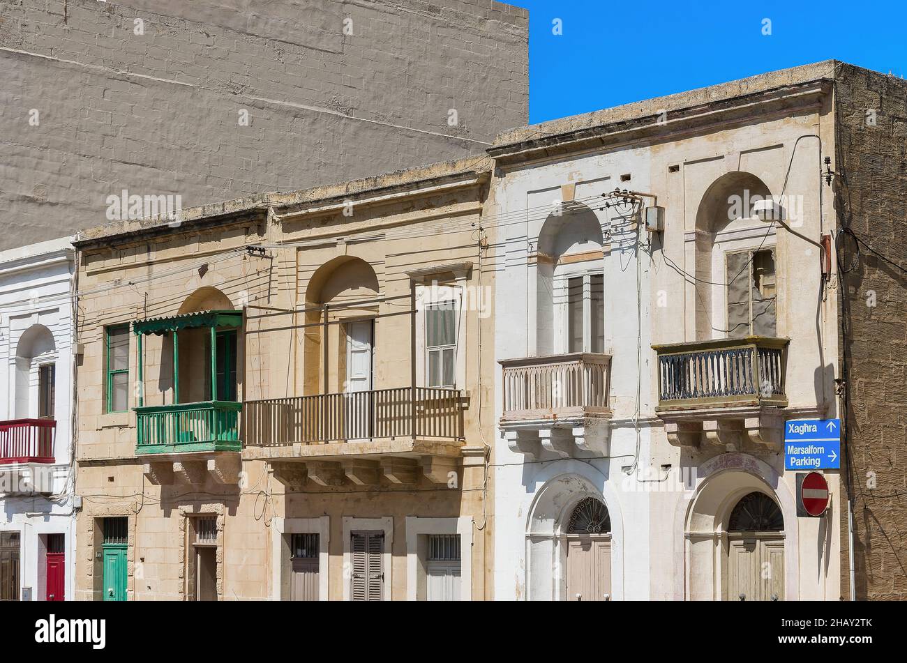Typical Maltese residential architecture with brightly coloured timber ...