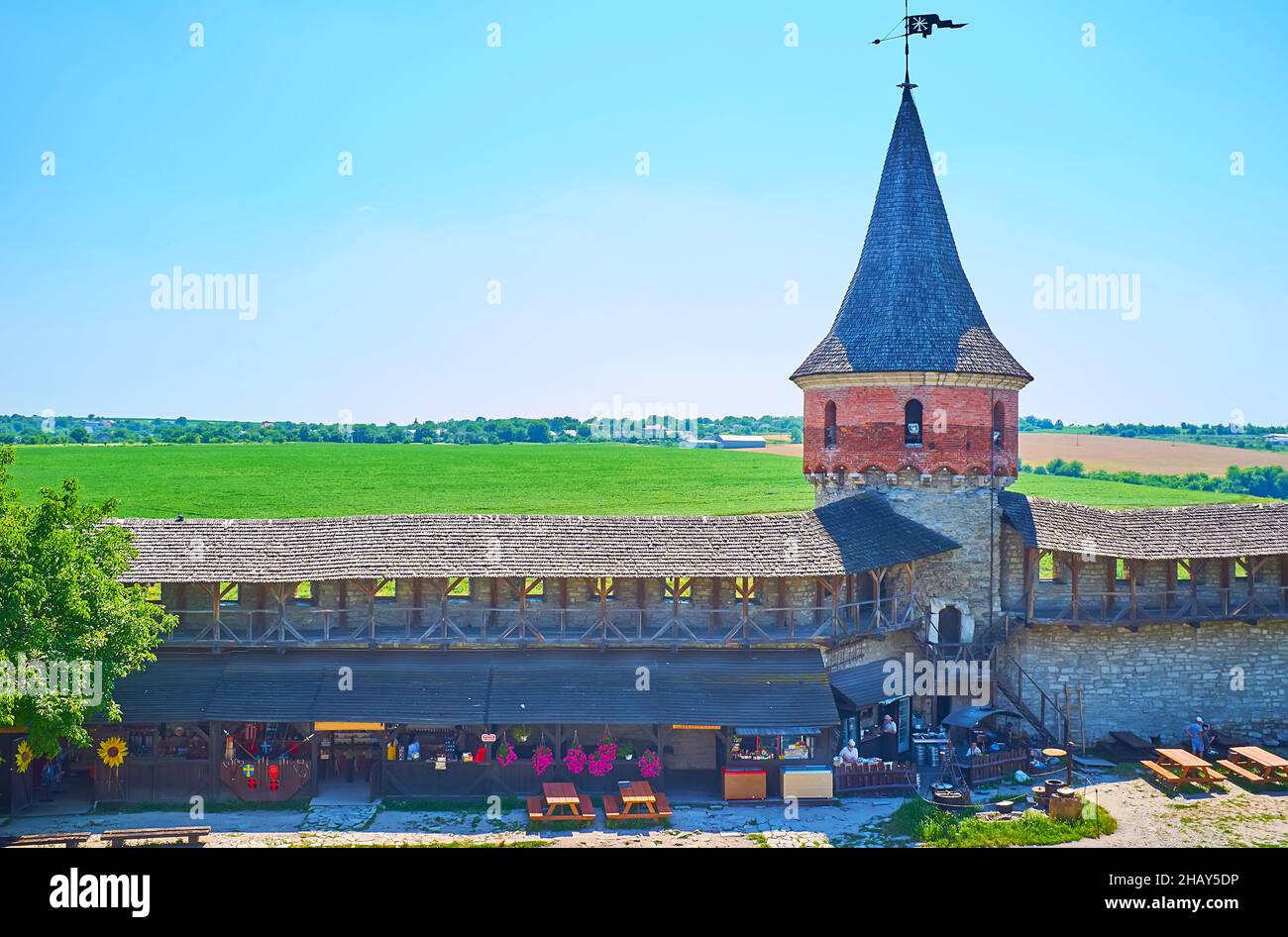 The medieval stone rampart and tall cone roofed Laska Tower of ...