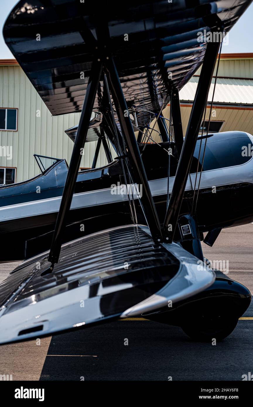 Vertical closeup shot of a black modern open cockpit aircraft Stock ...