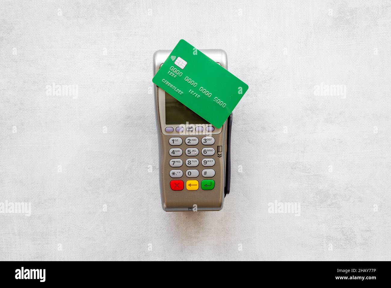 Payment transactions with pos credit card terminal, top view Stock ...