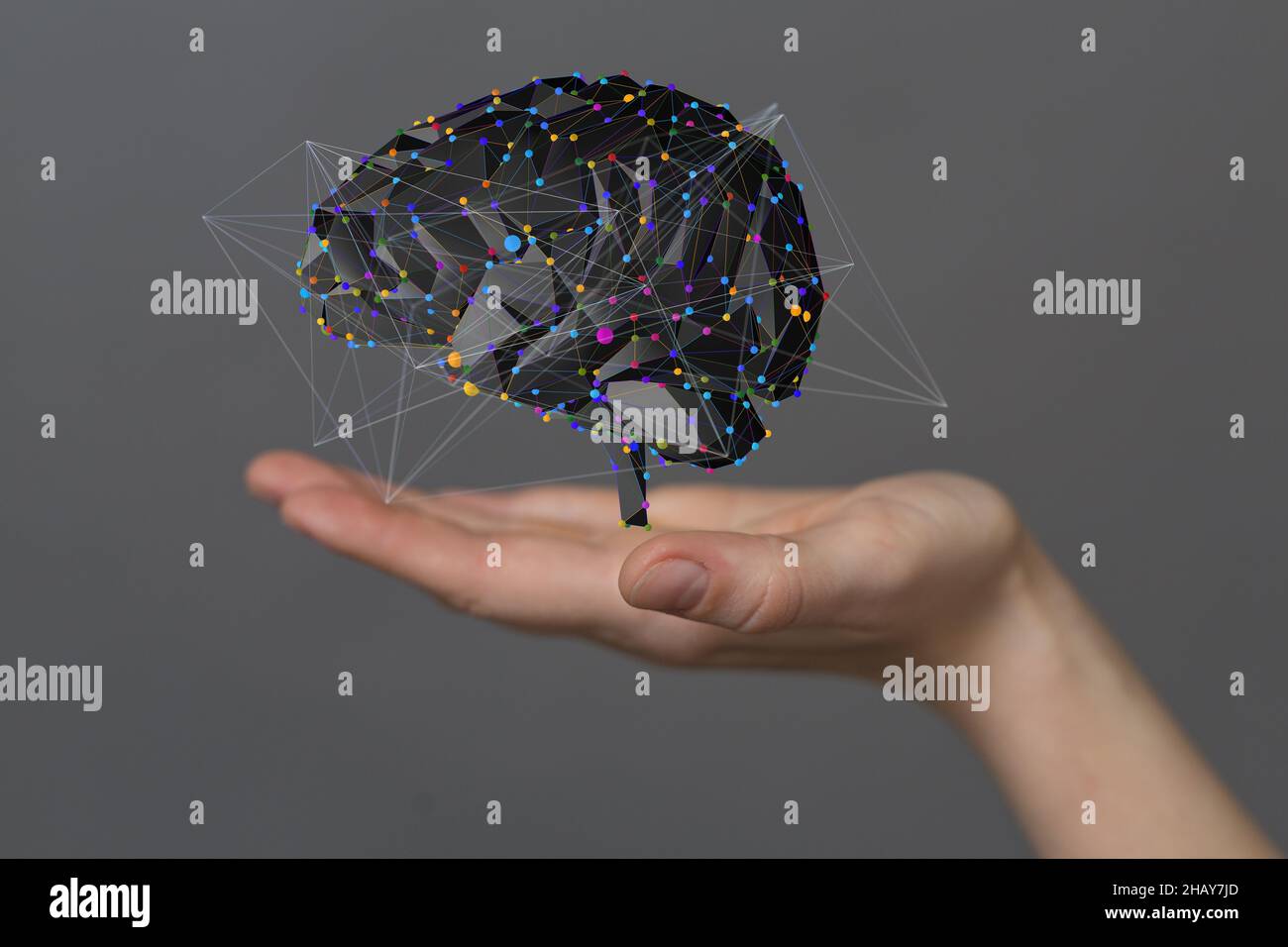 3D rendered Artificial Intelligence in a person's hand Stock Photo - Alamy