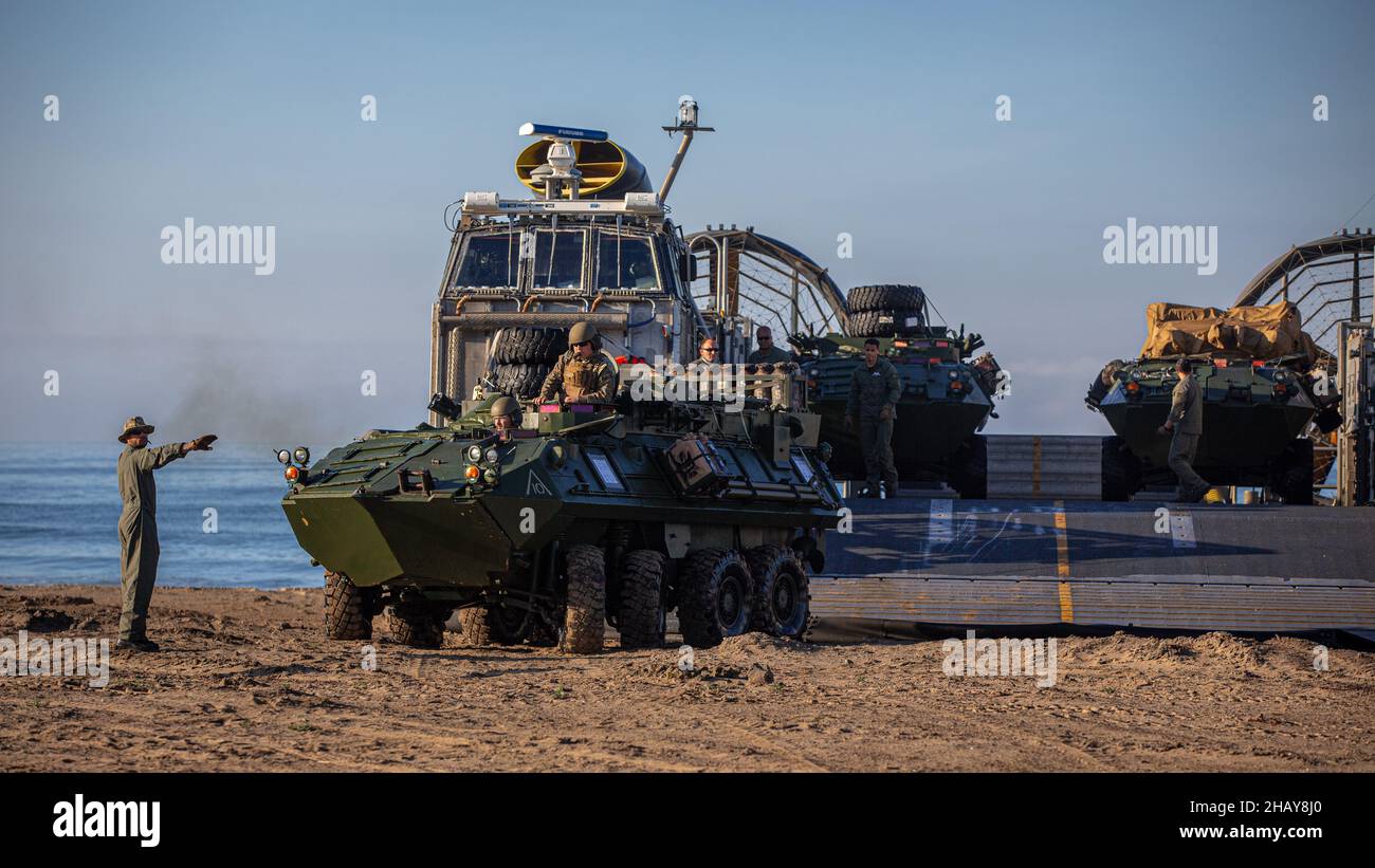 U.S. Marines with 1st Light Armored Reconnaissance Battalion, unloads ...