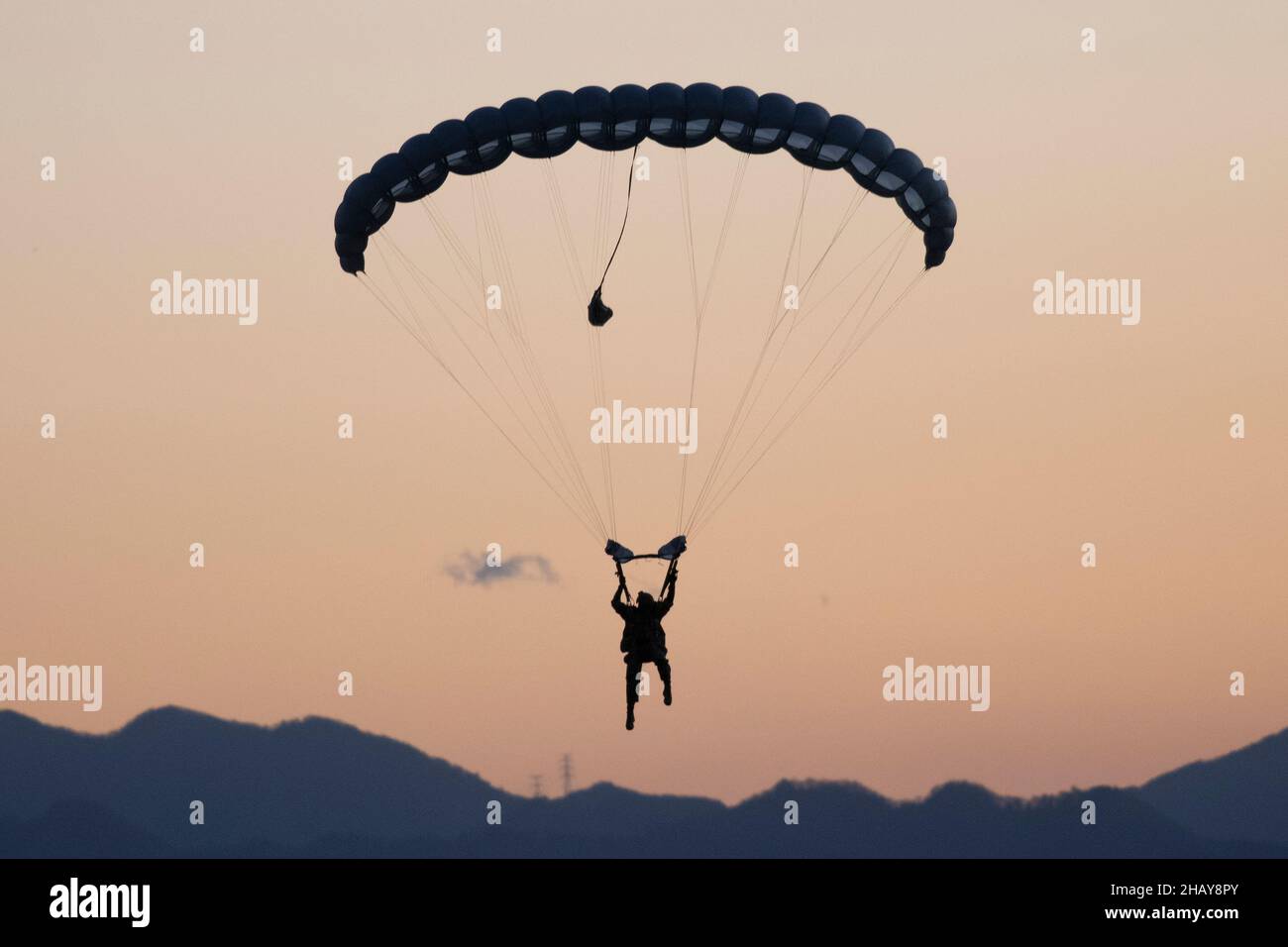 A Marine assigned to the 3rd Reconnaissance Battalion, 3rd Marine ...