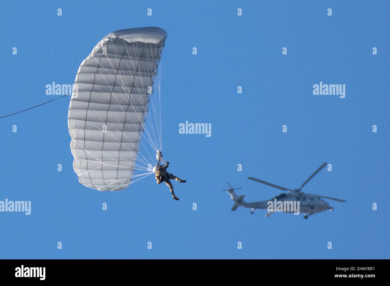 A Marine assigned to the 3rd Reconnaissance Battalion, 3rd Marine ...