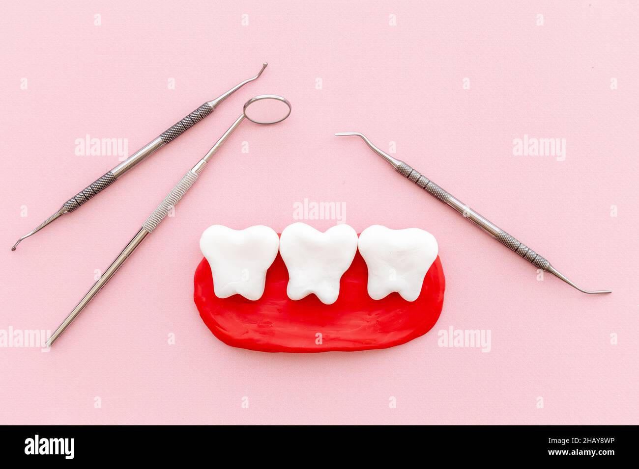 Teeth models with dentist tools. Oral health and care concept Stock ...