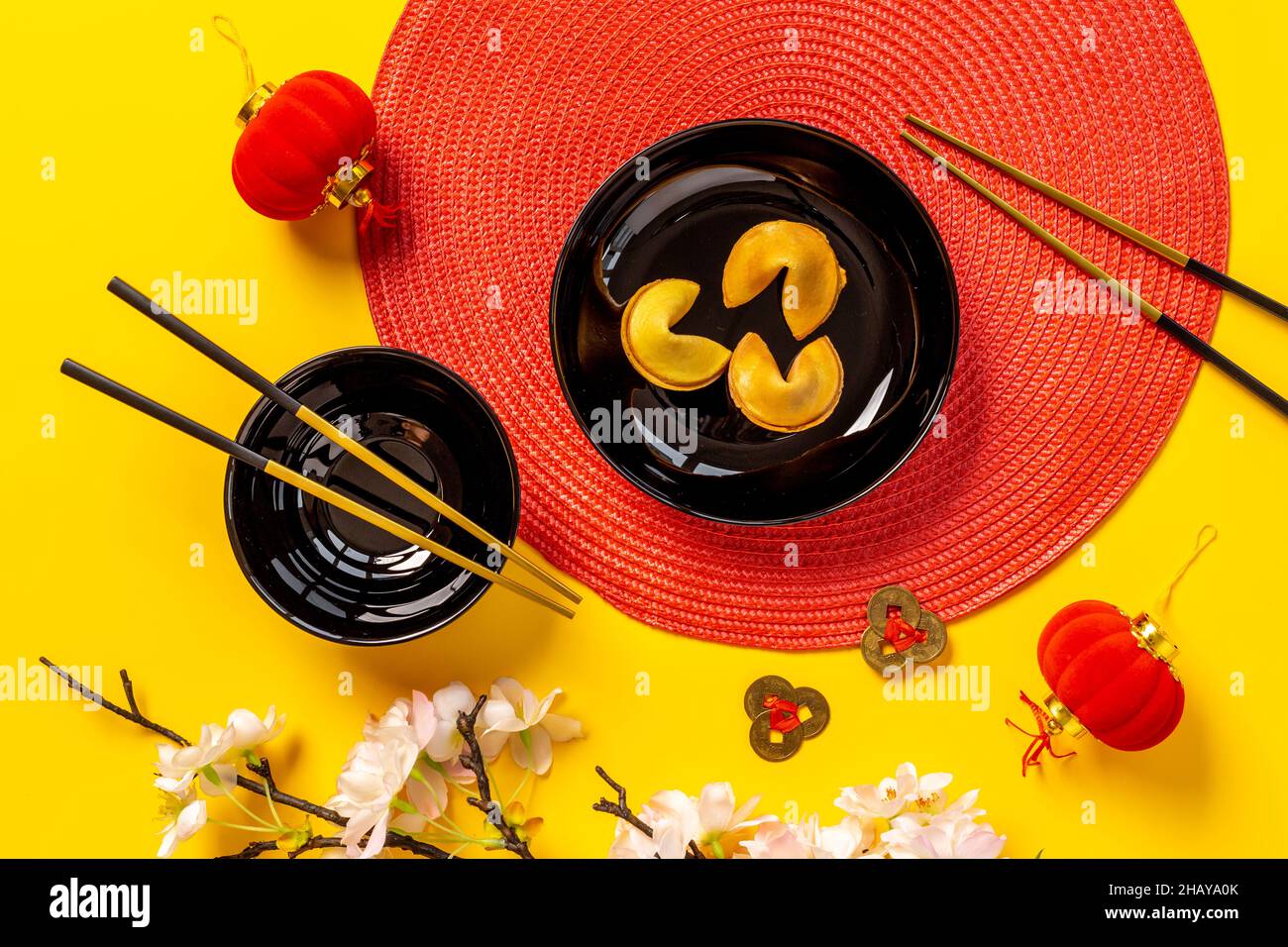 Asian dining table place setting with chopsticks and red mat Stock ...