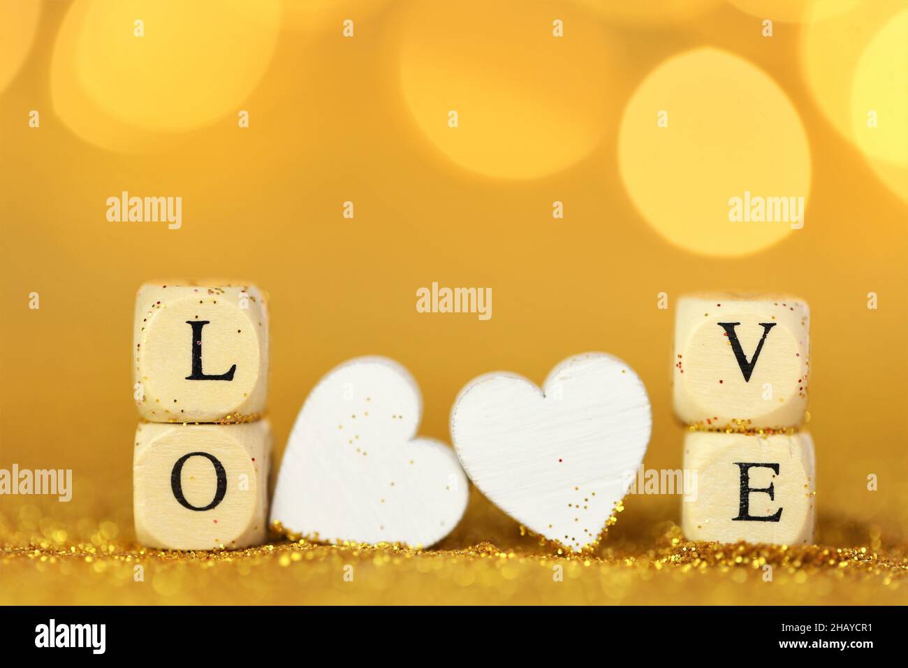 Love in gold letters hi-res stock photography and images - Alamy