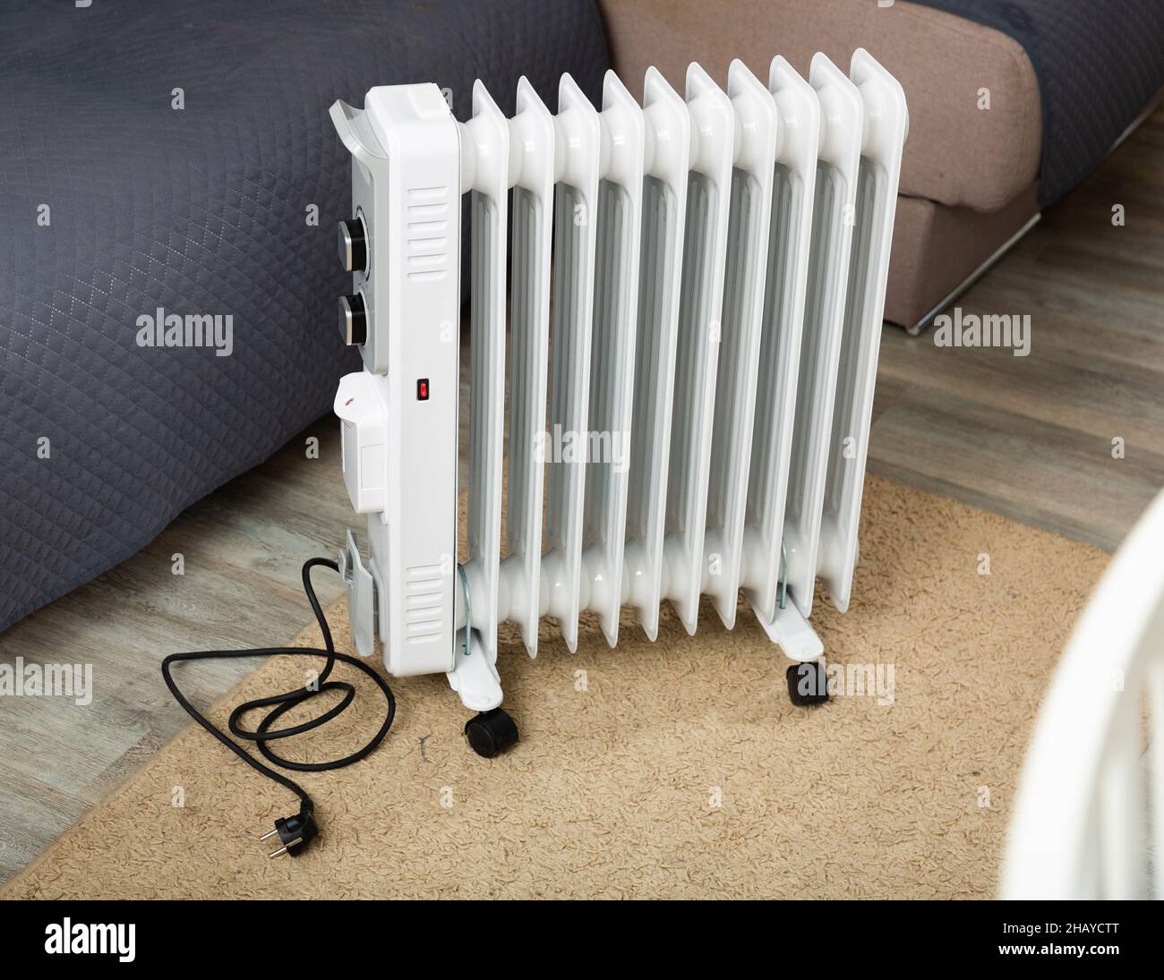 Oil filled radiator used in an room standing in center of room Stock ...