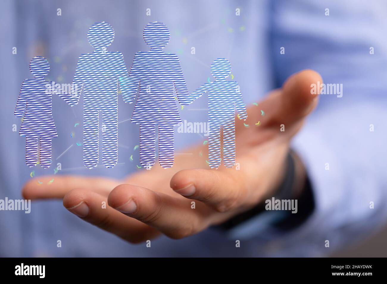 Hologram of a family in a person's hand Stock Photo - Alamy