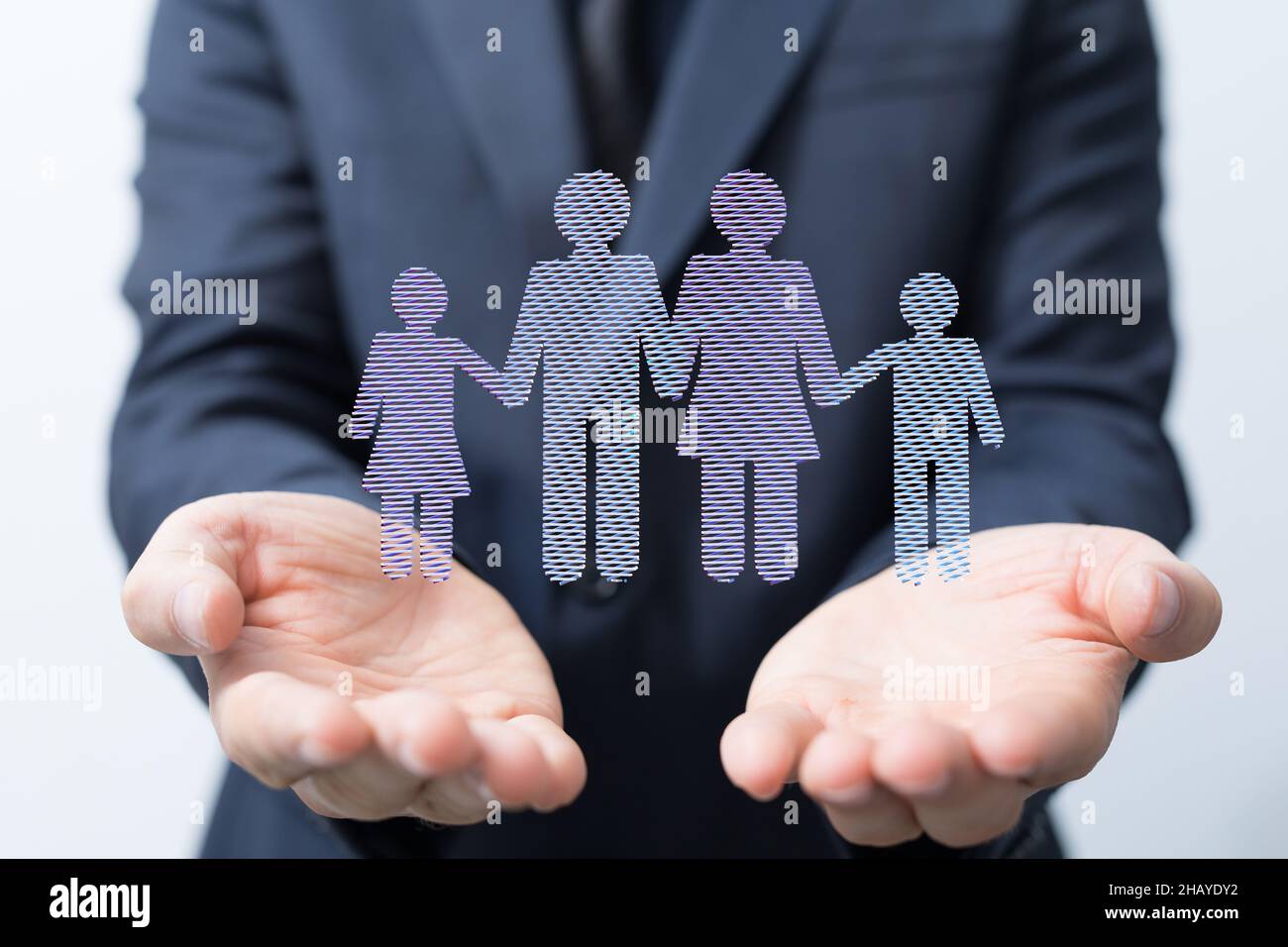 Hologram of a family in a person's hand Stock Photo - Alamy
