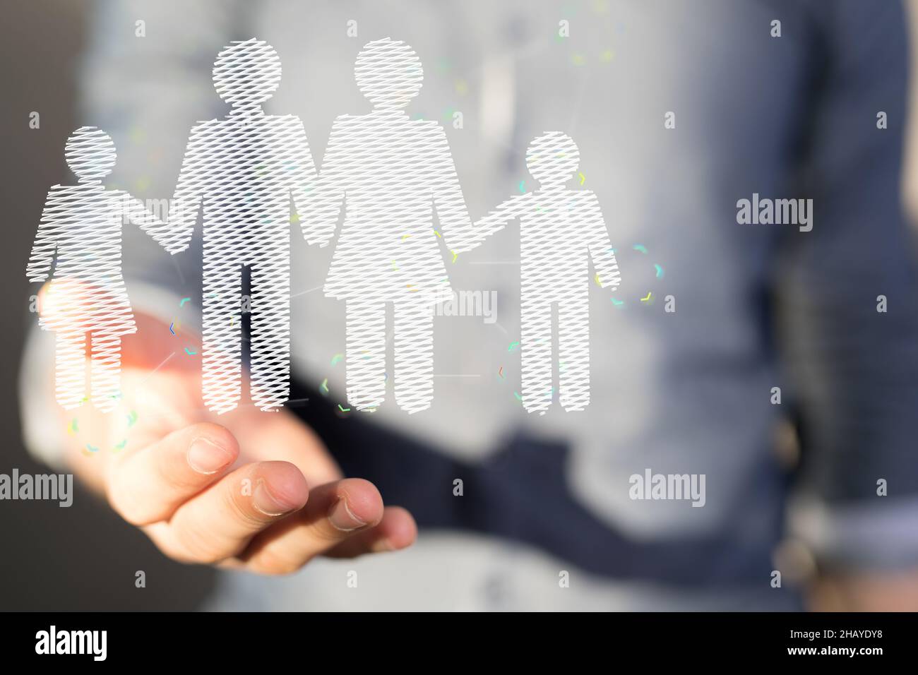 Hologram of a family in a person's hand Stock Photo - Alamy