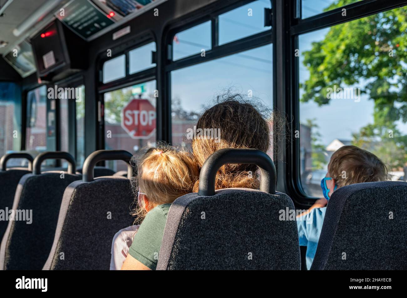 Child parent bus hi-res stock photography and images - Alamy