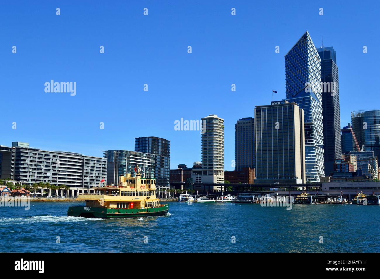 A ferry pulls into the busy Circular Quay Ferry Terminal in Sydney ...