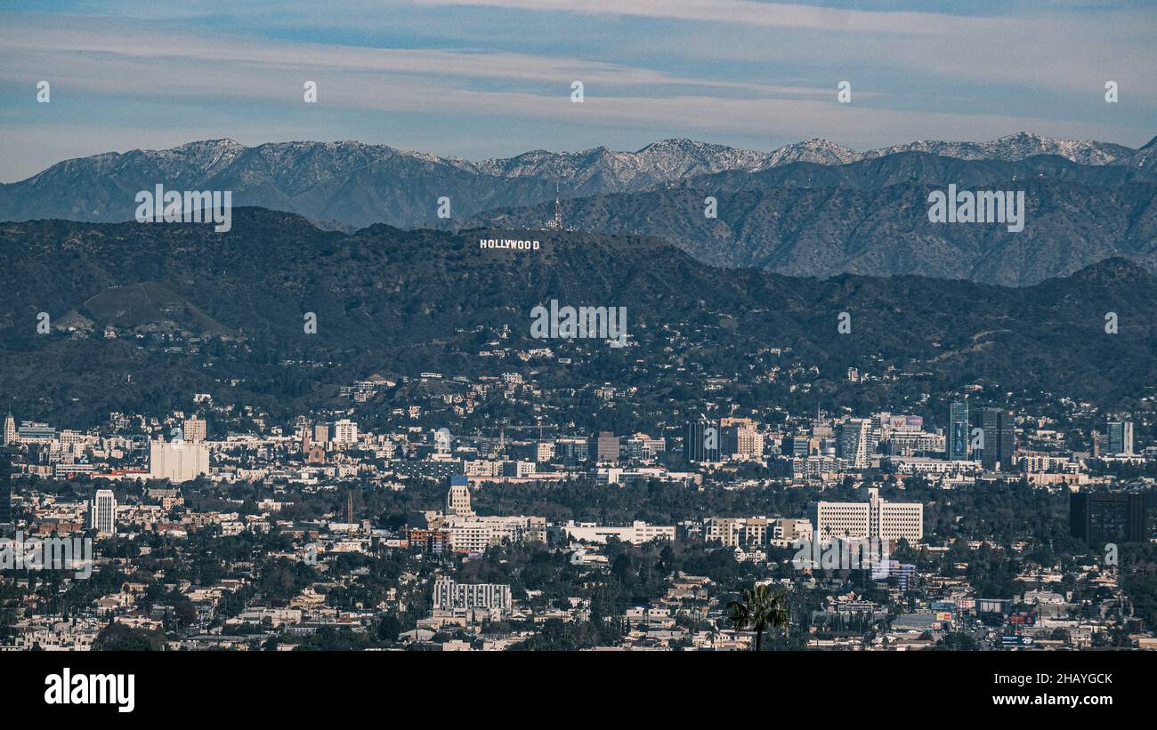 Los Angeles, California, USA. 15th Dec, 2021. Snow capped mountains behind downtown Los Angeles ...