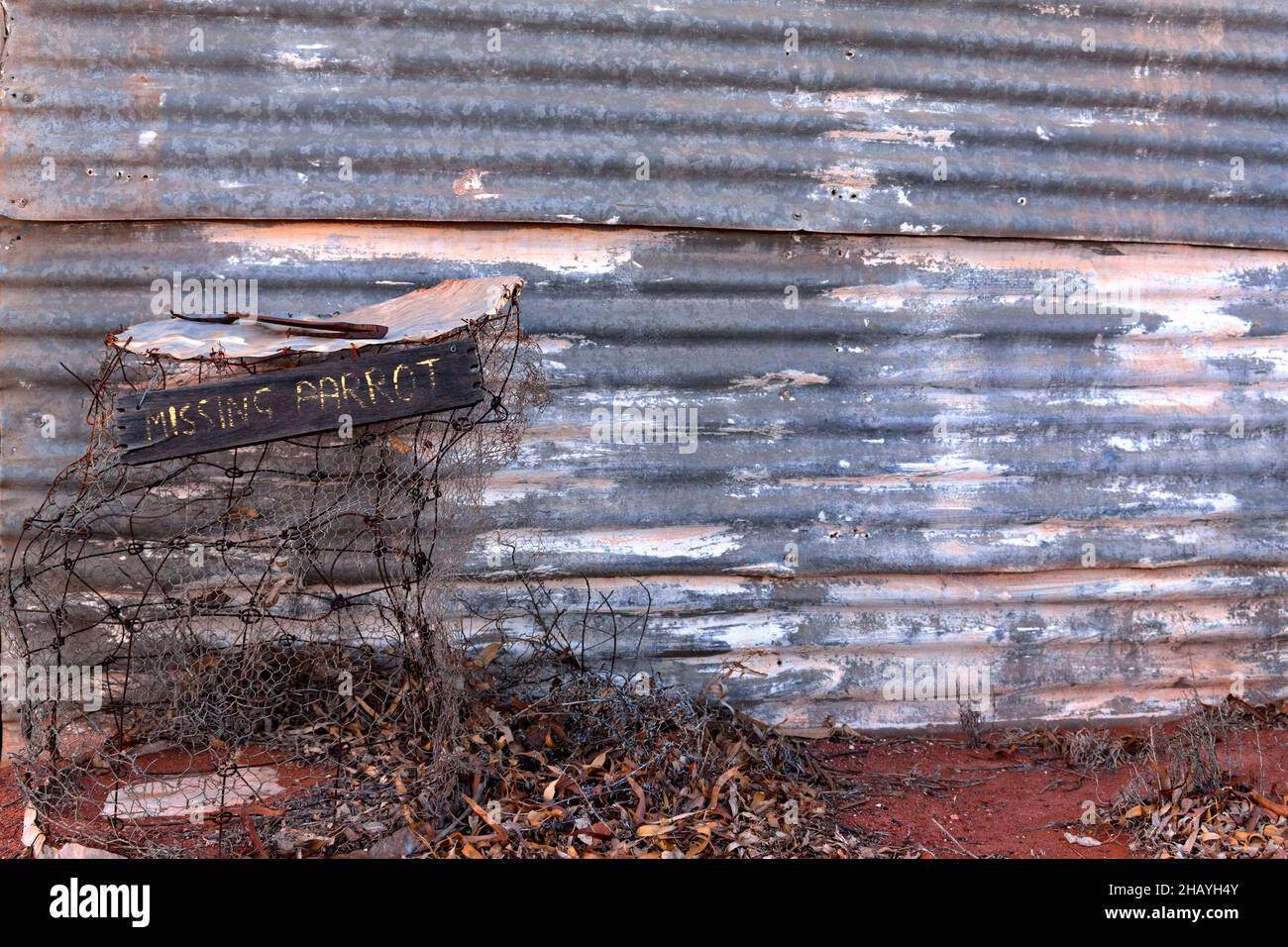 Damaged bird cage with missing parrot sign, Gwalia, Leonora, Western ...