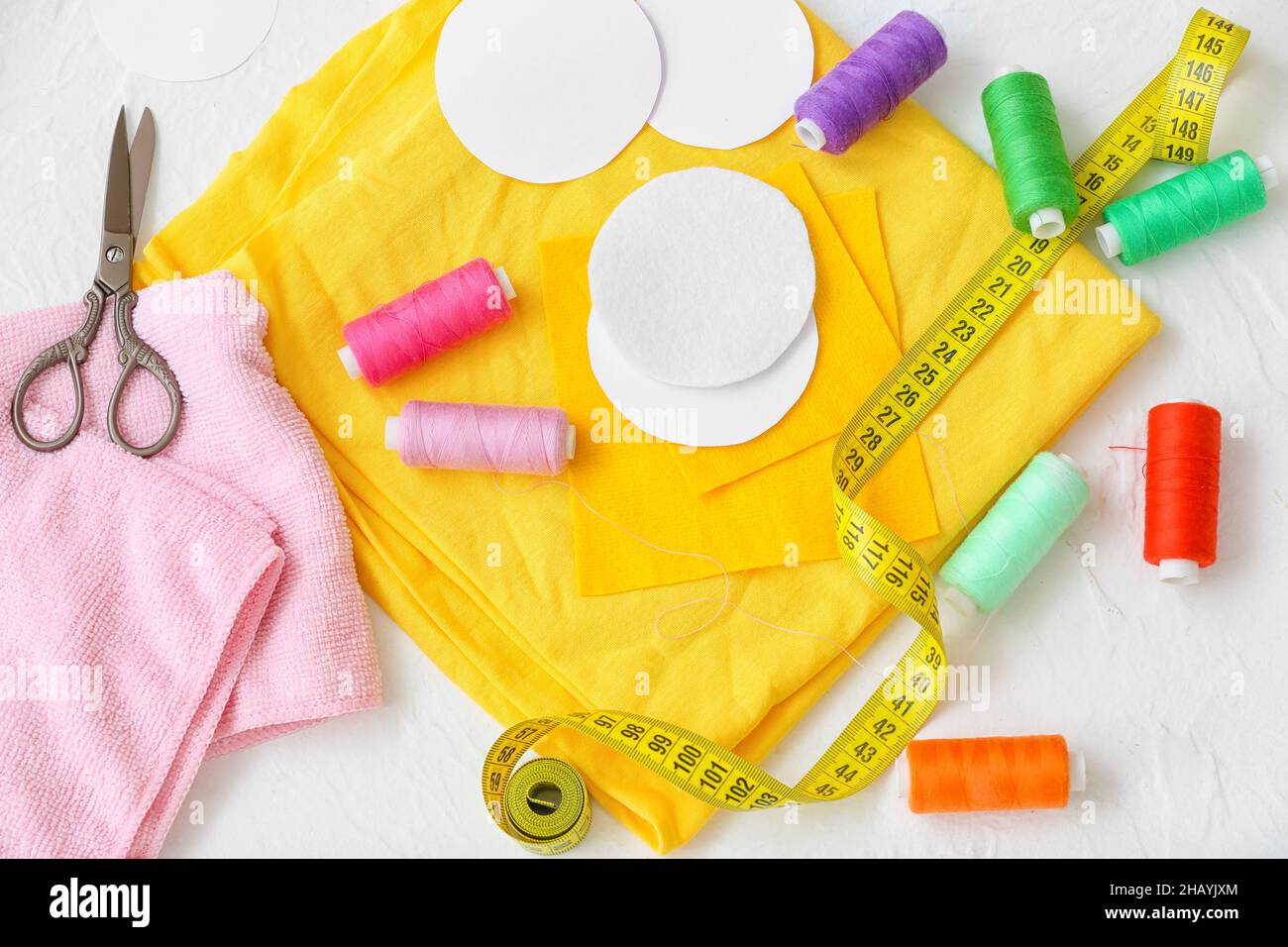 Materials for making reusable cotton pads on white background Stock ...