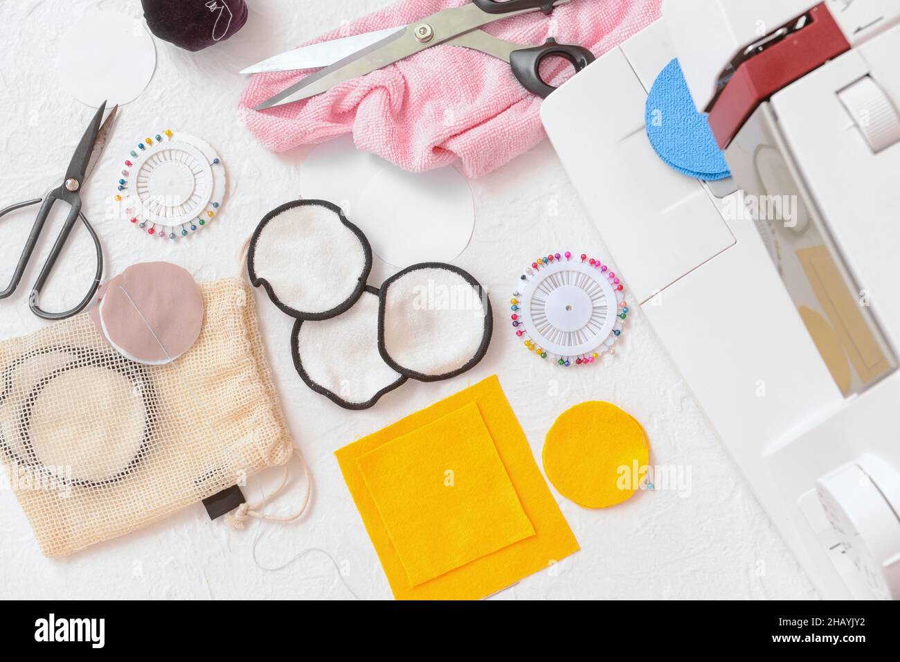Materials for making reusable cotton pads on white background Stock ...