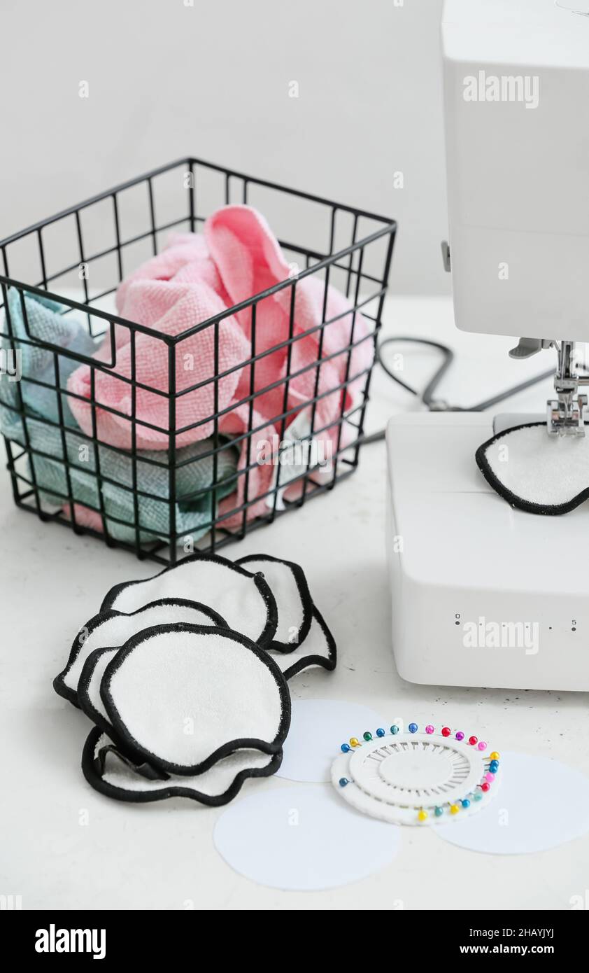 Handmade cotton pads with materials on white background Stock Photo - Alamy