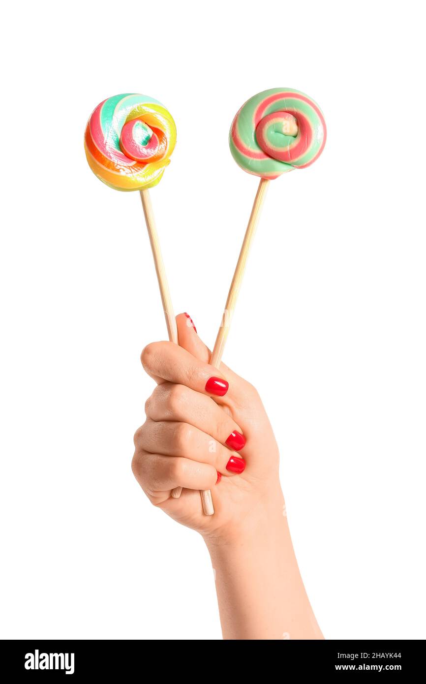 Hand holding sweets Cut Out Stock Images & Pictures - Alamy