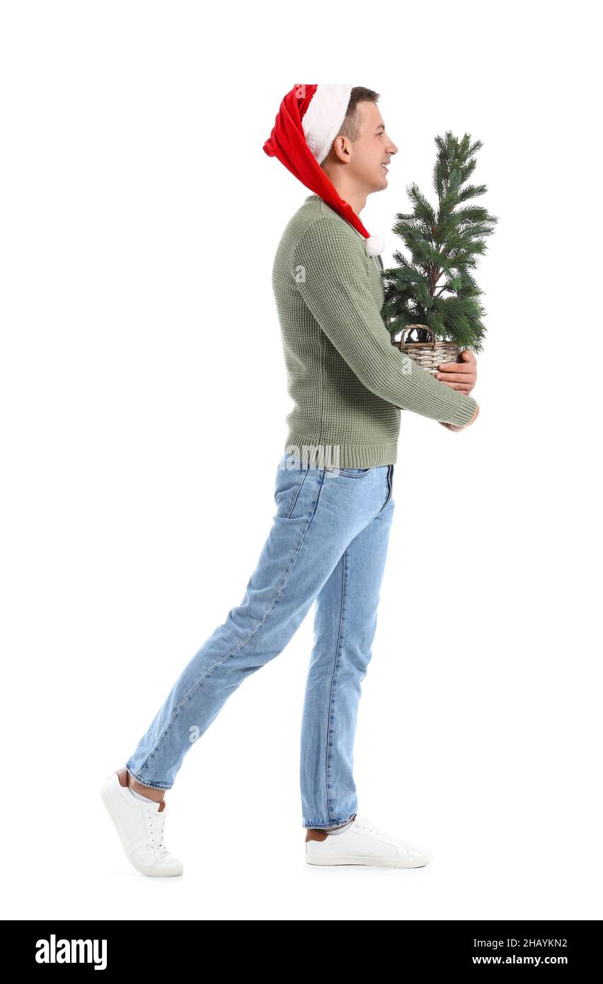 Man carry xmas tree hi-res stock photography and images - Alamy