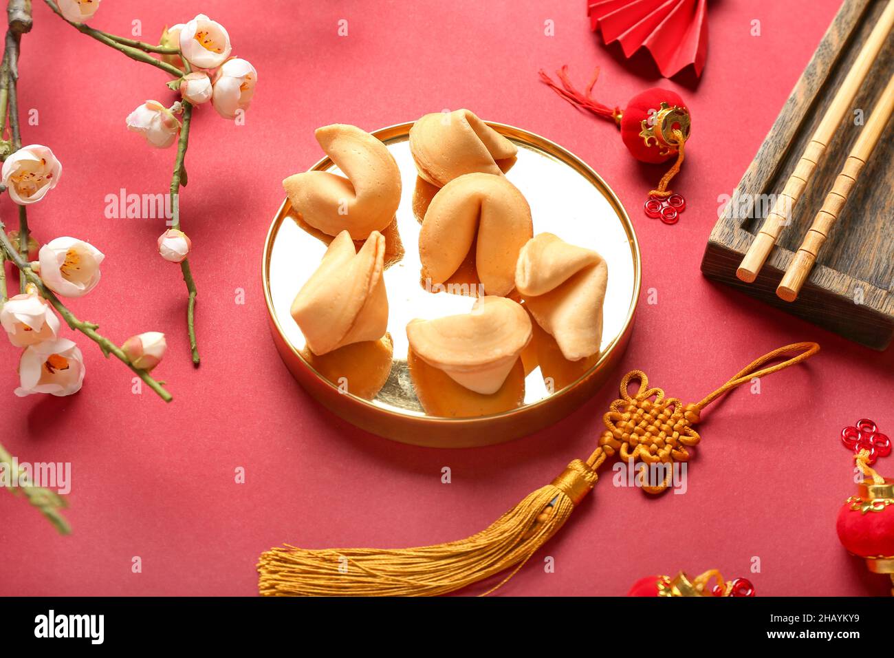 Traditional fortune cookies with Chinese symbols on red background ...