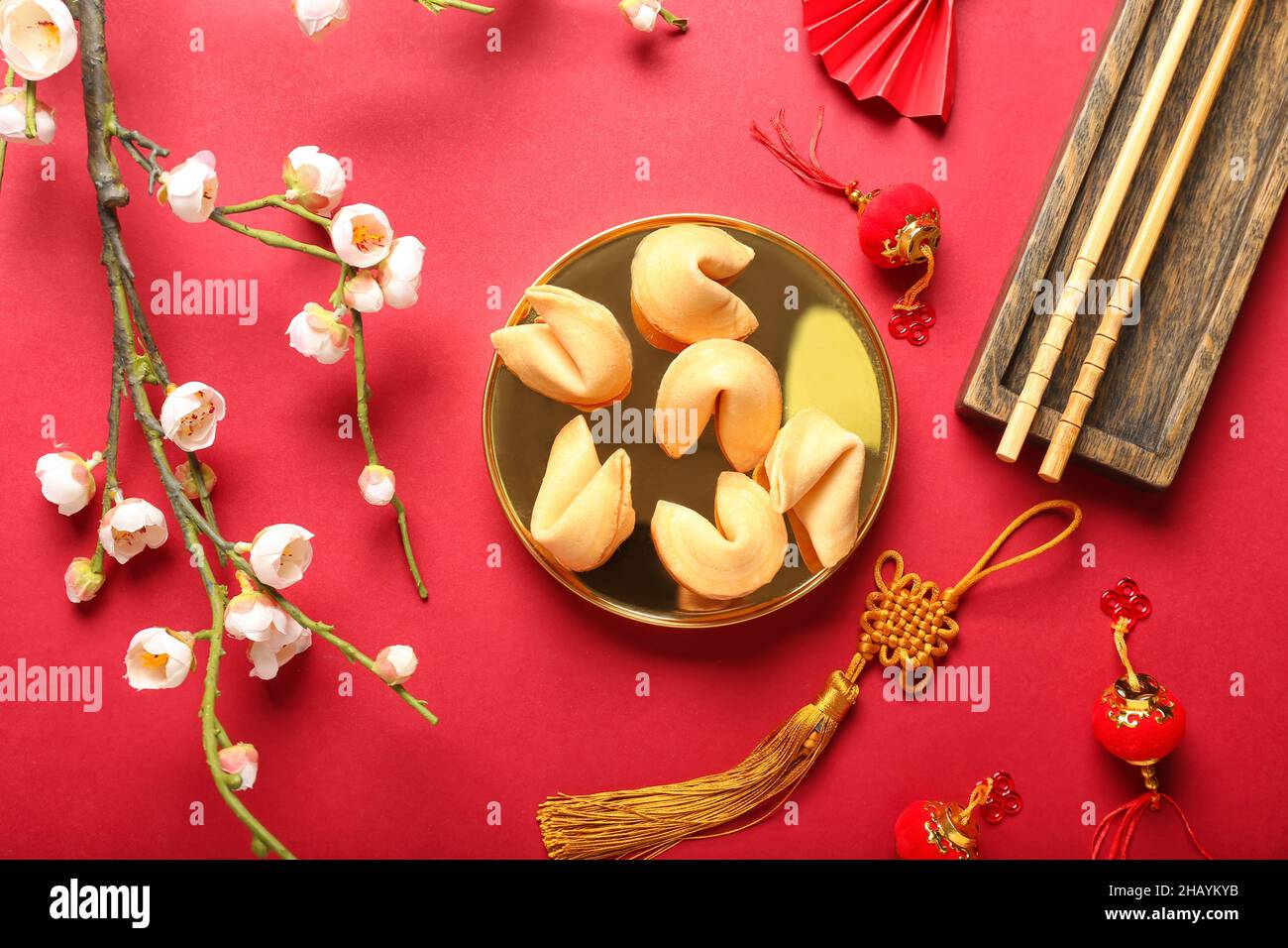 Traditional fortune cookies with Chinese symbols on red background ...