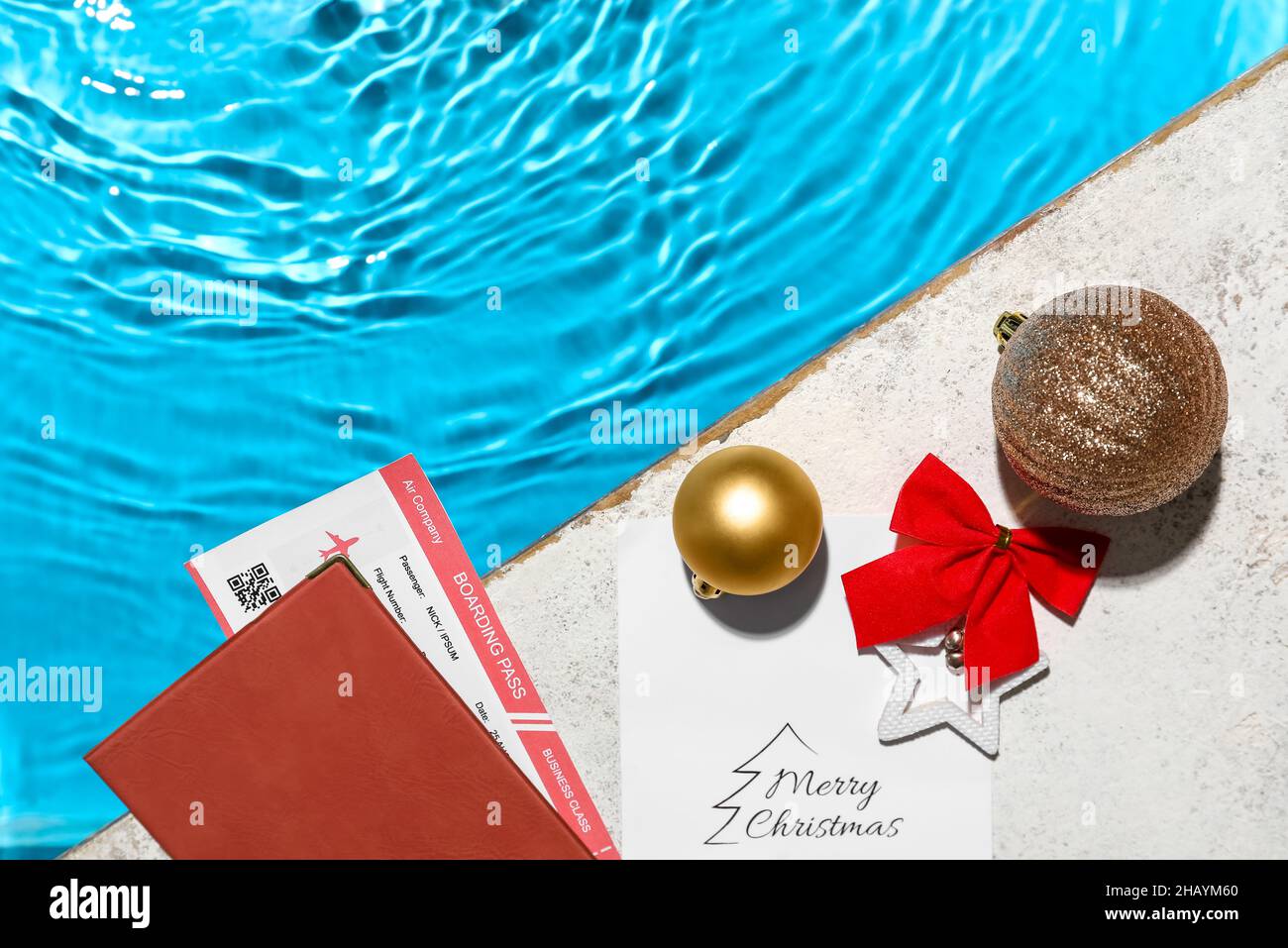 Passport with ticket and greeting card for Merry Christmas near ...