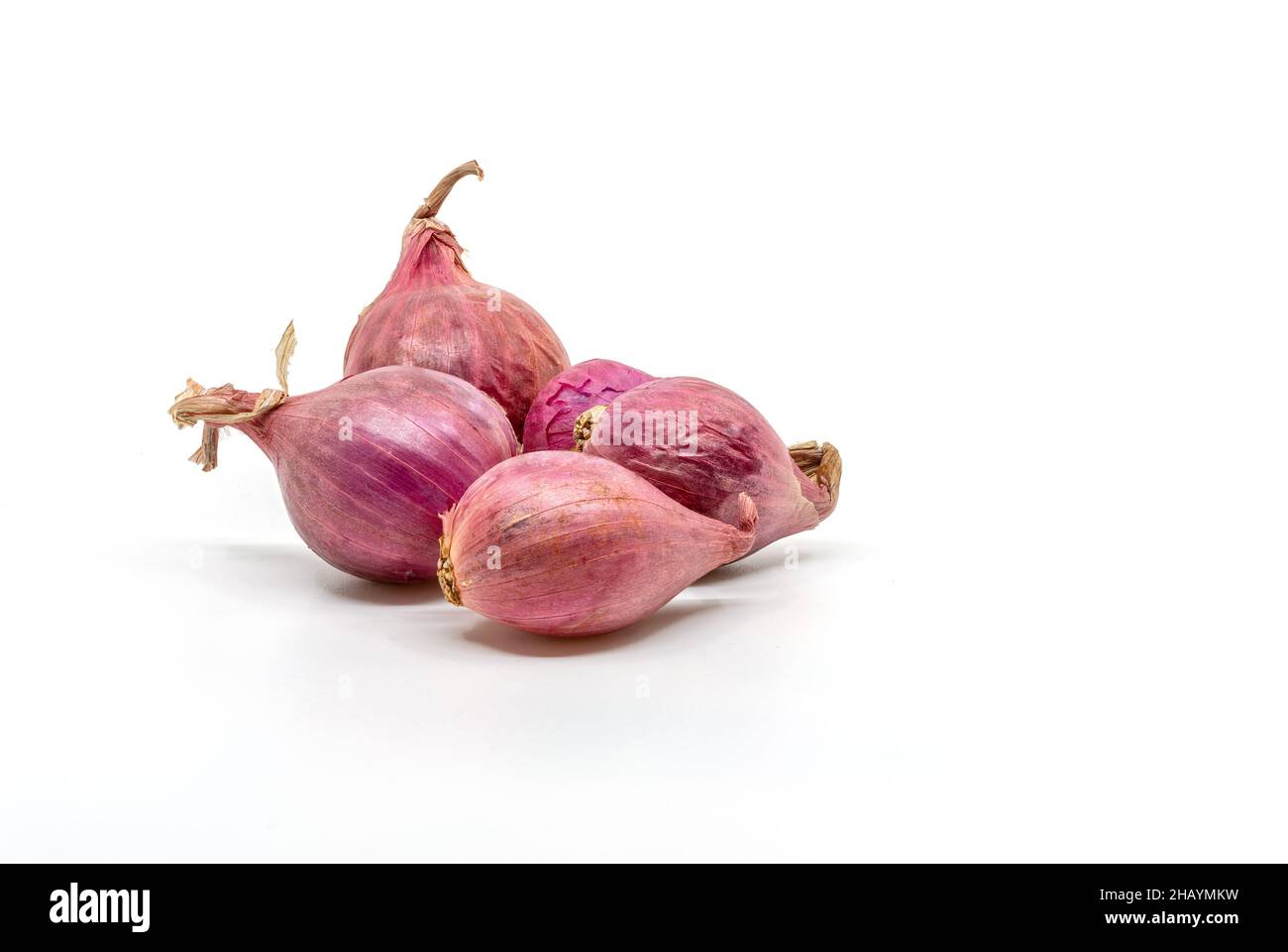 Close up a small group of organic shallot on white background, front ...