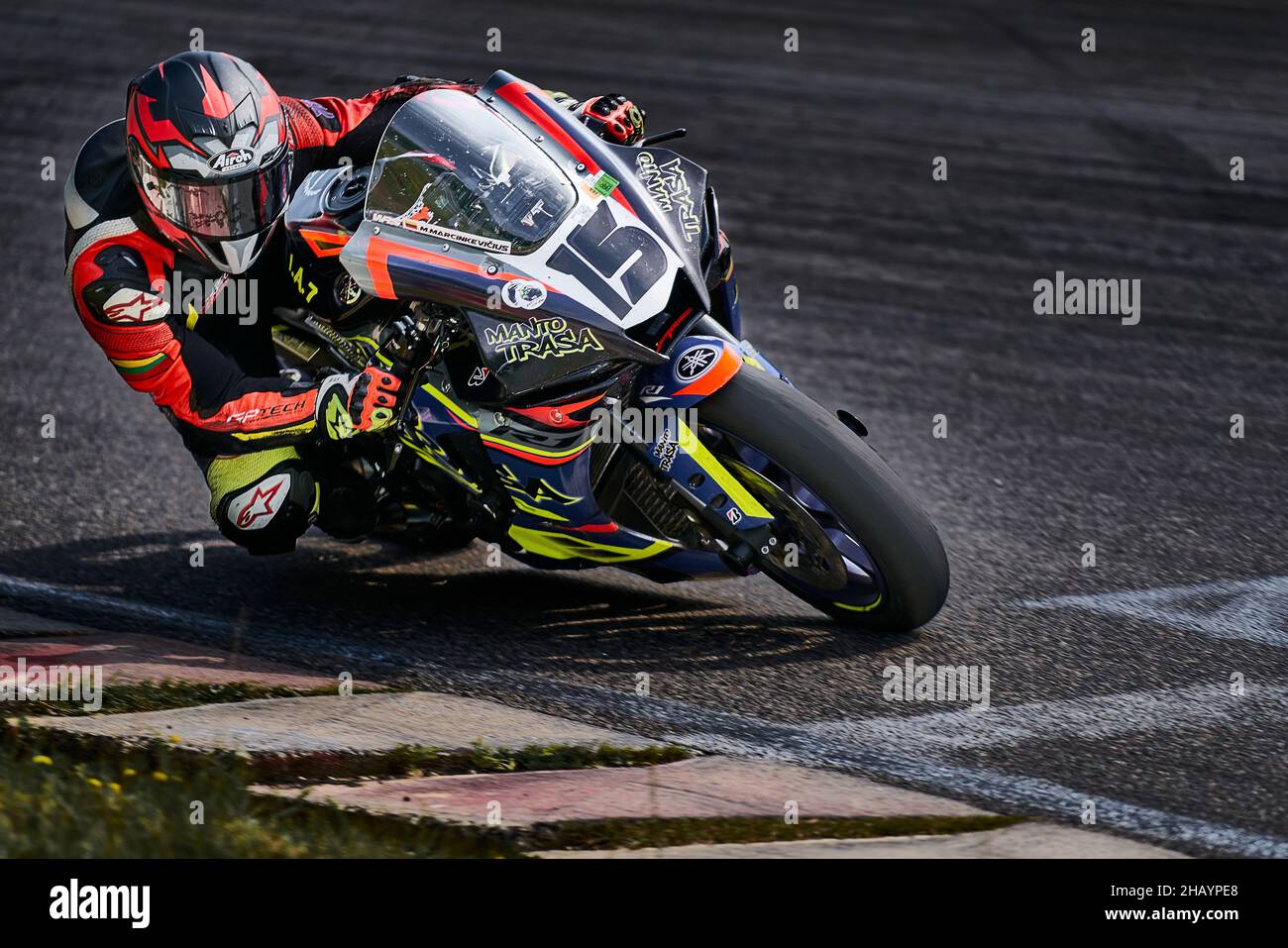 12-12-2021 Riga, Latvia Motorcycle practice leaning into a fast corner ...