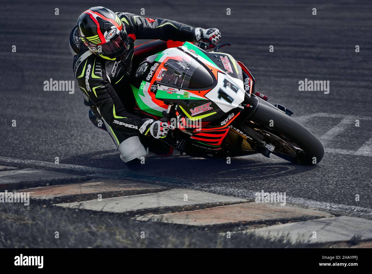 12-12-2021 Riga, Latvia Motorcycle practice leaning into a fast corner ...