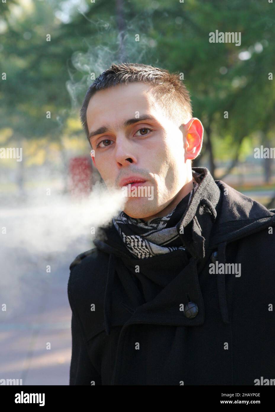 Man smoking in forest addiction hi-res stock photography and images - Alamy