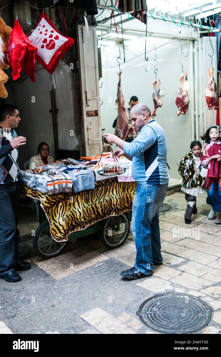 Palestinian tea delivery to different shop owners in the in the old ...