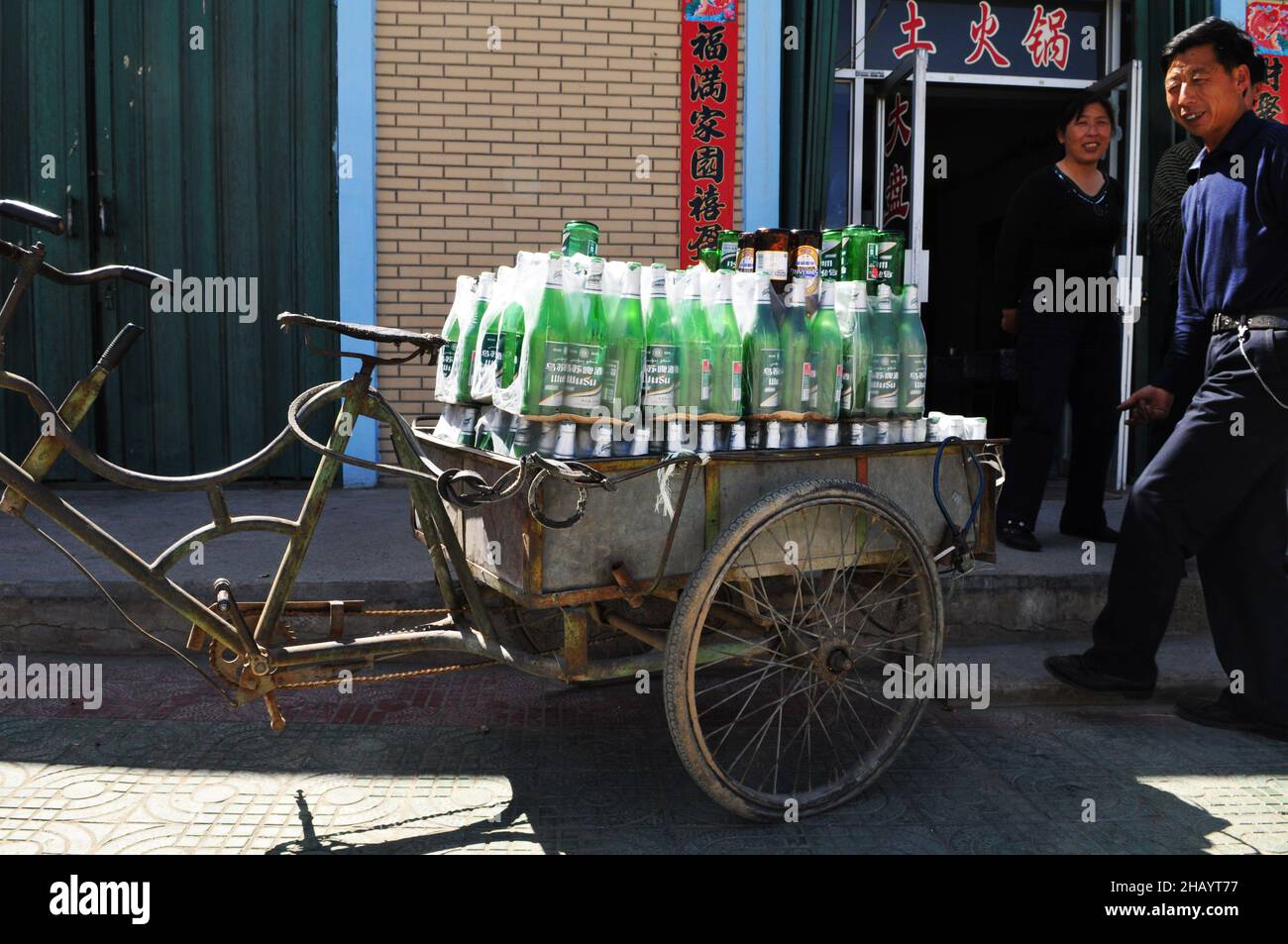 Wusu beer delivery in a small town in north eastern Xinjiang province ...