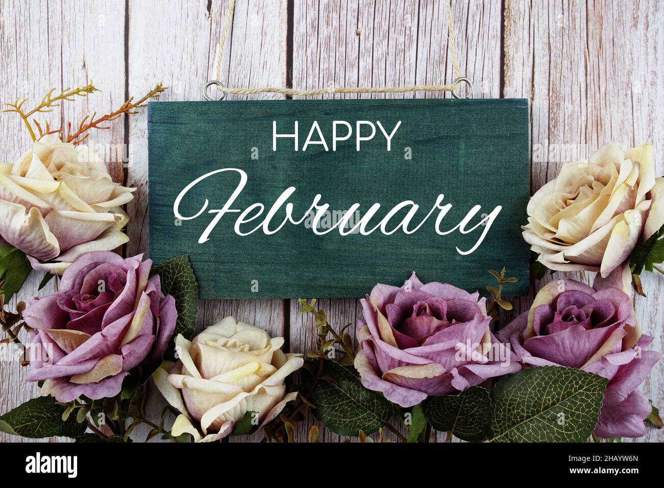 Happy February typography text with roses flowers bouquet on wooden ...