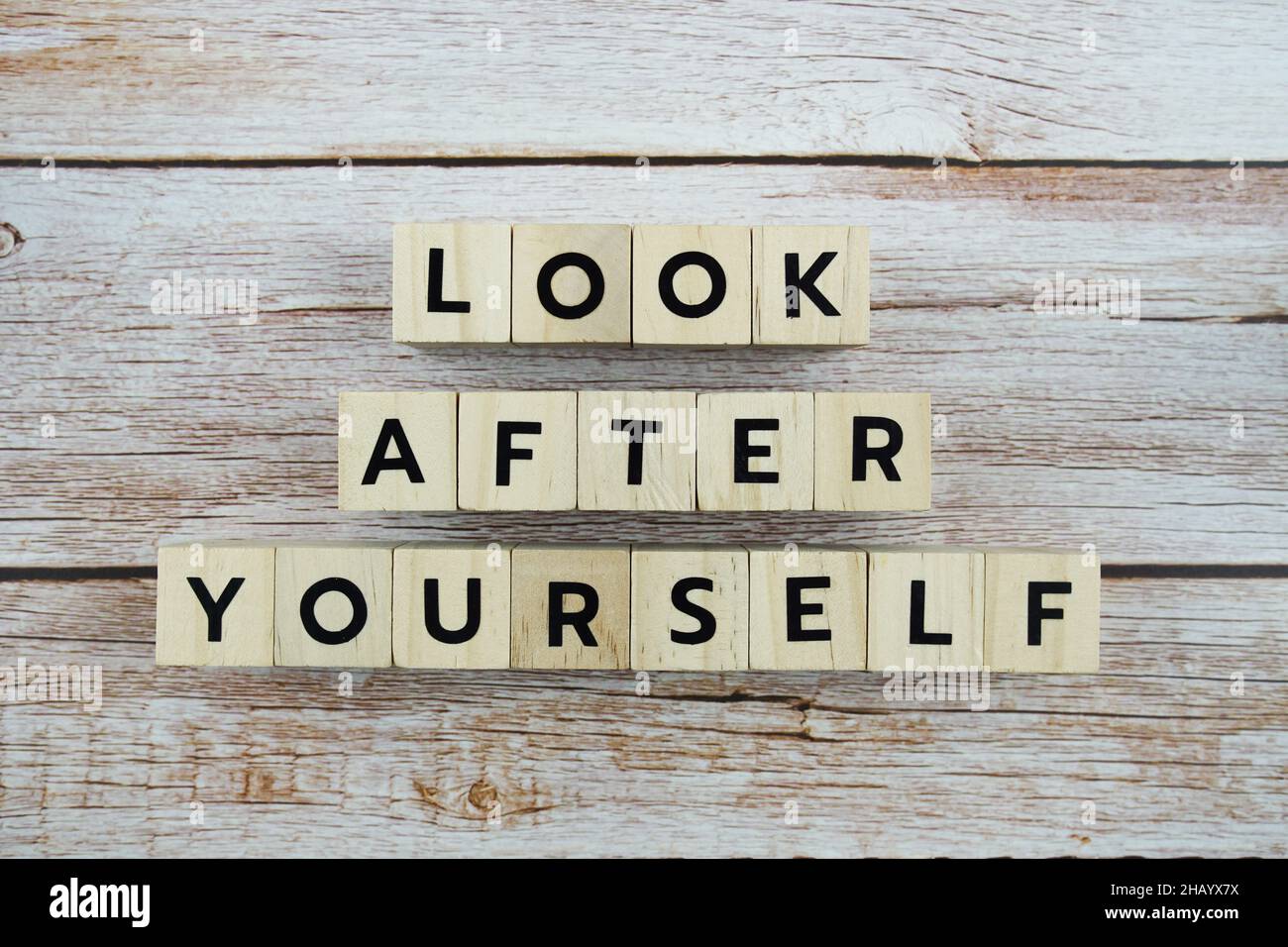 Look After Yourself word alphabet letters on wooden background Stock ...