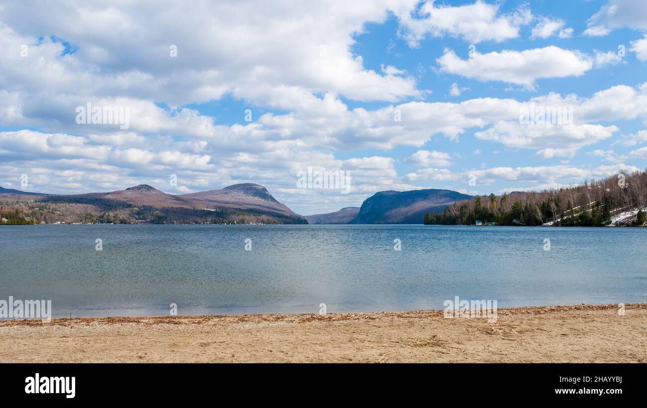 Lake Willoughby - a deep blue lake flanked by steep mountains in ...