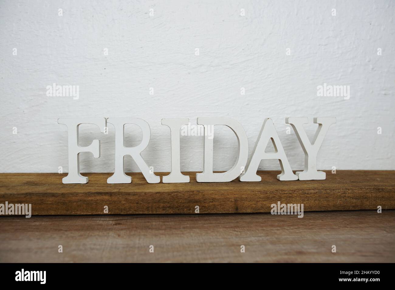 Friday alphabet letters on wooden background Stock Photo - Alamy