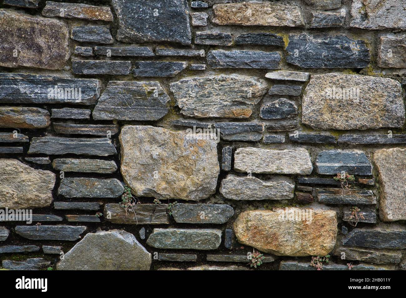 Stone wall background design Stock Photo - Alamy