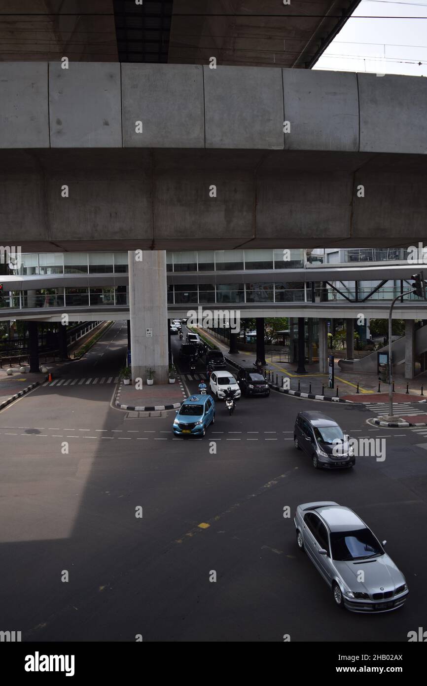 Motorcycle and cars are riding on street at CSW ASEAN integrated ...