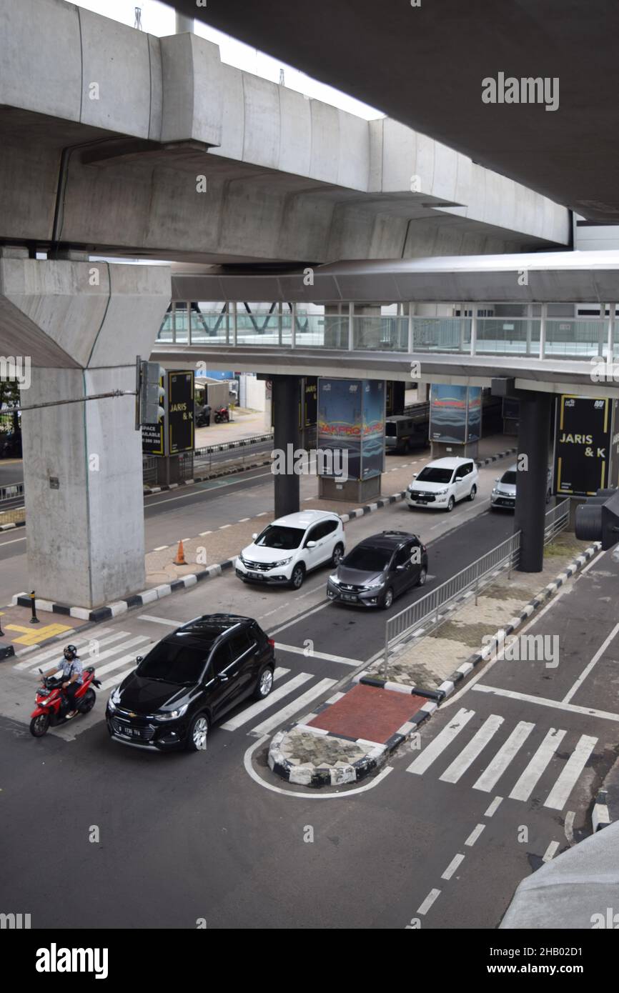 Motorcycle and cars are riding on street at CSW ASEAN integrated ...