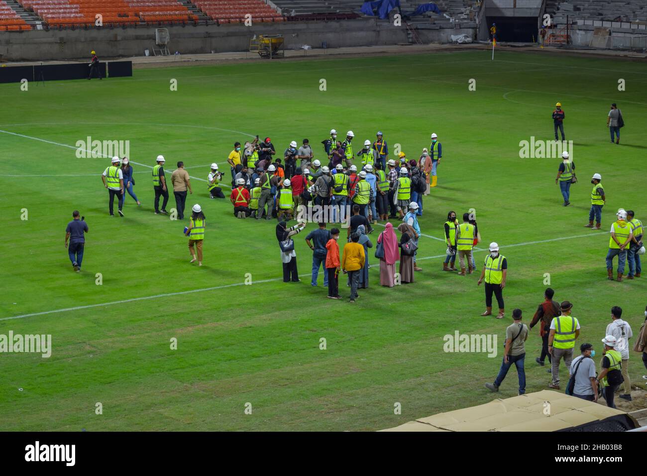 A lot people crowded of new football stadium for upcomming Indonesia ...