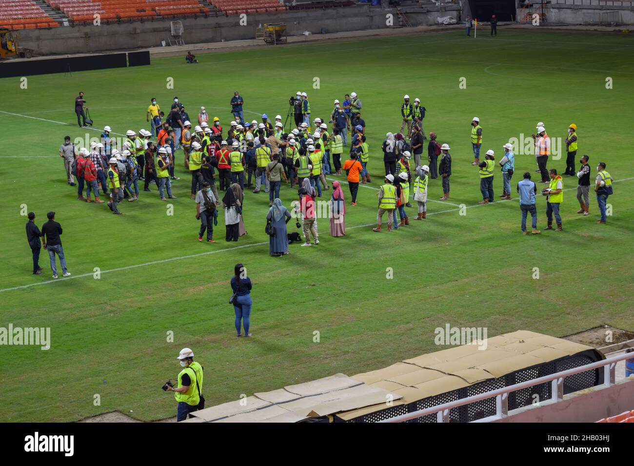 A lot people crowded of new football stadium for upcomming Indonesia ...