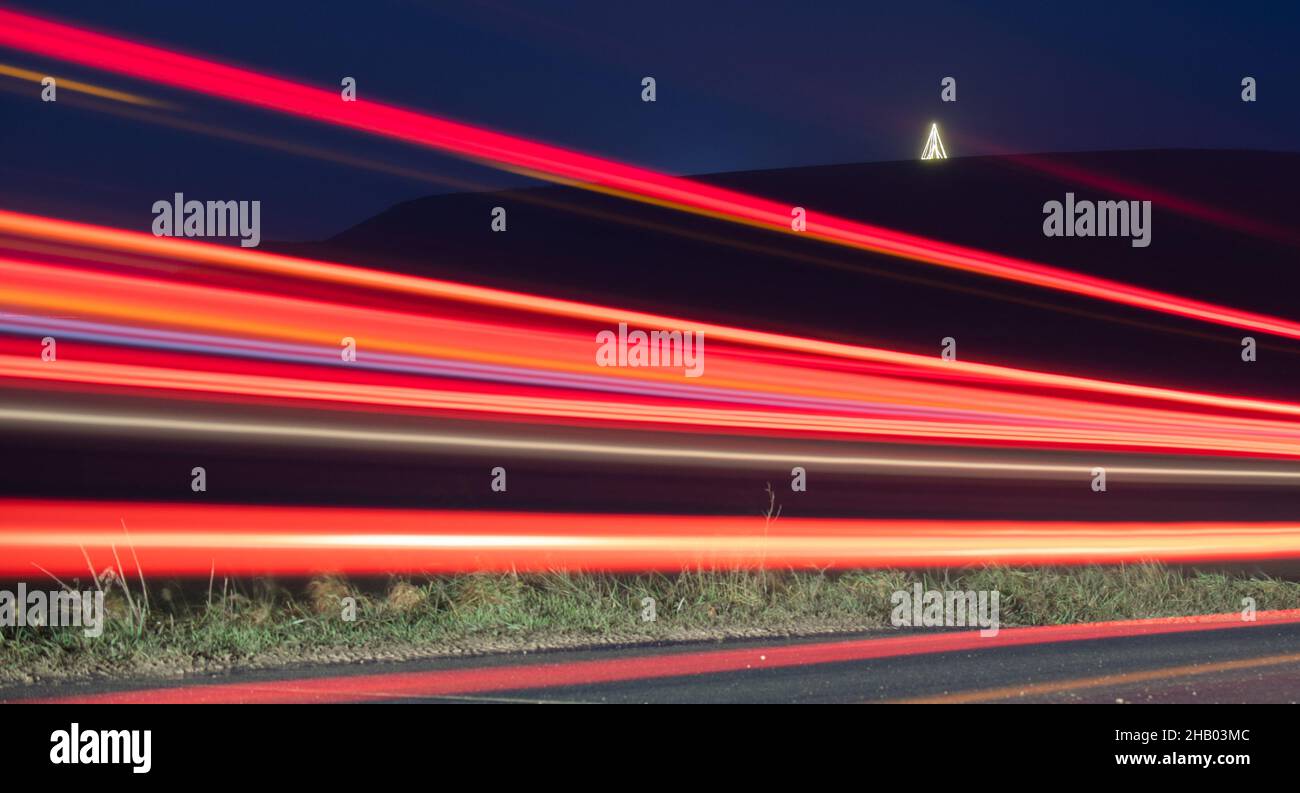 Sehnde, Germany. 16th Dec, 2021. Strings of lights form a plain ...