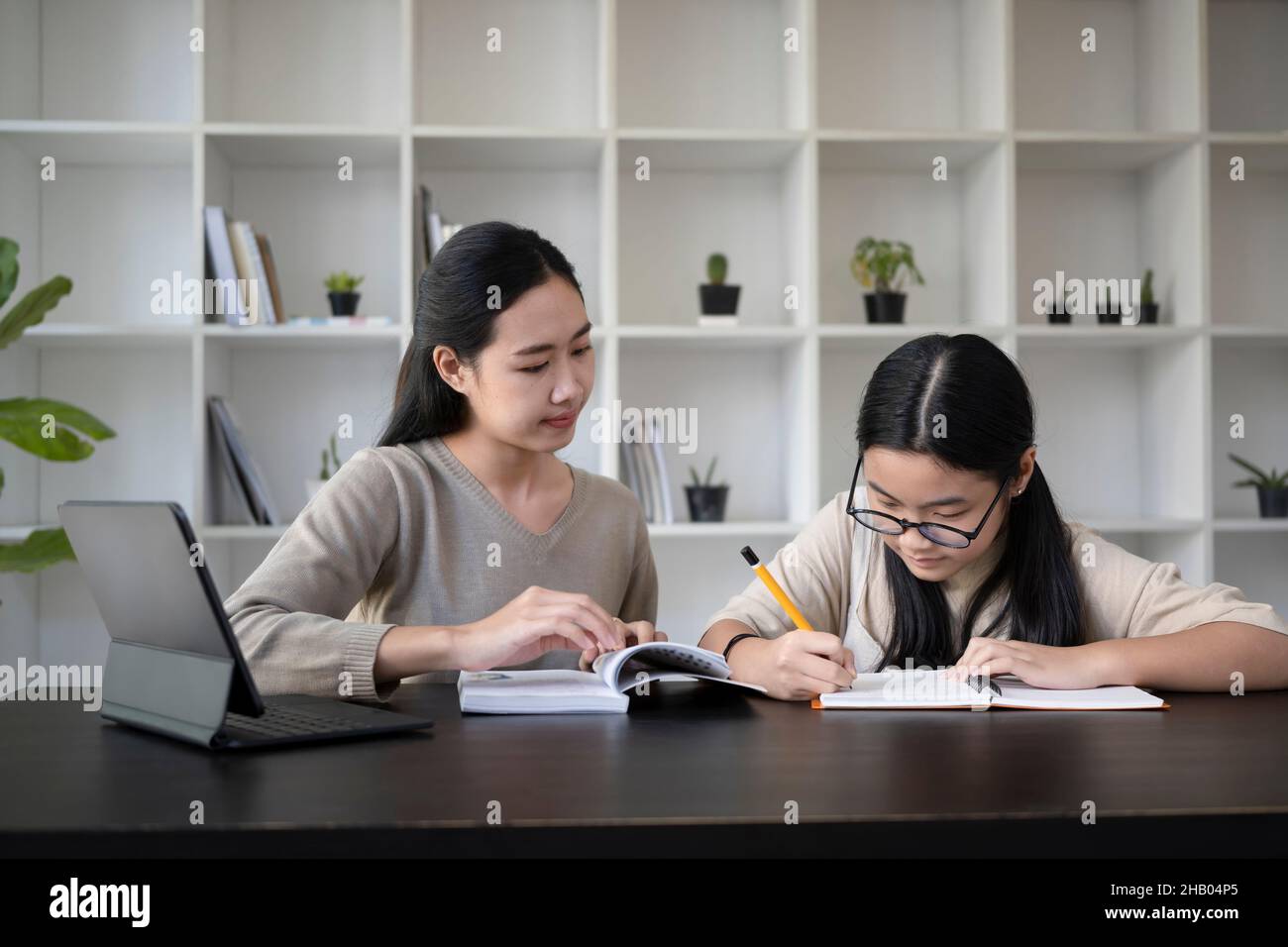 Smiling korean schoolgirl hi-res stock photography and images - Alamy