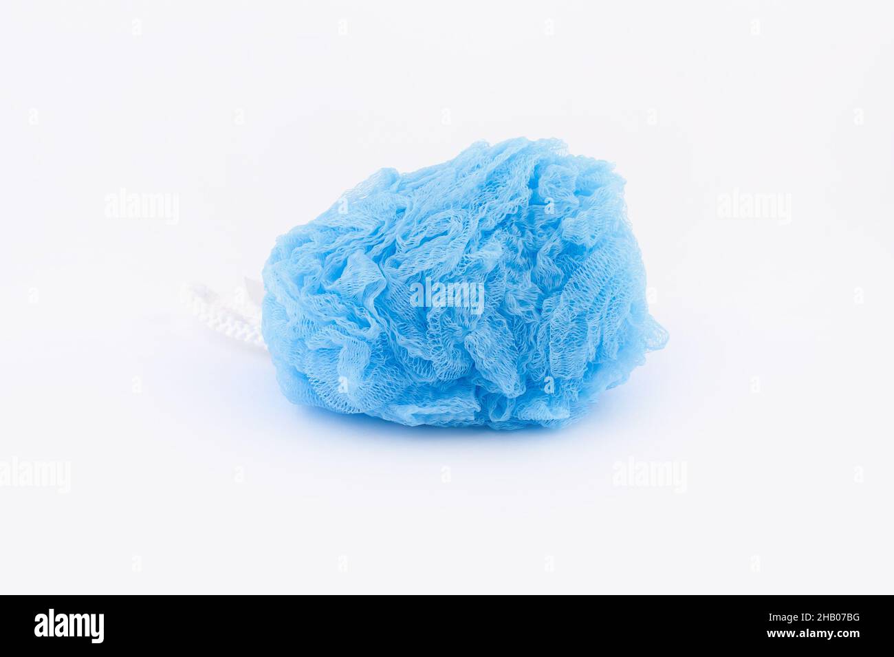 Soft blue bath puff or sponge isolated on white background. Studio ...