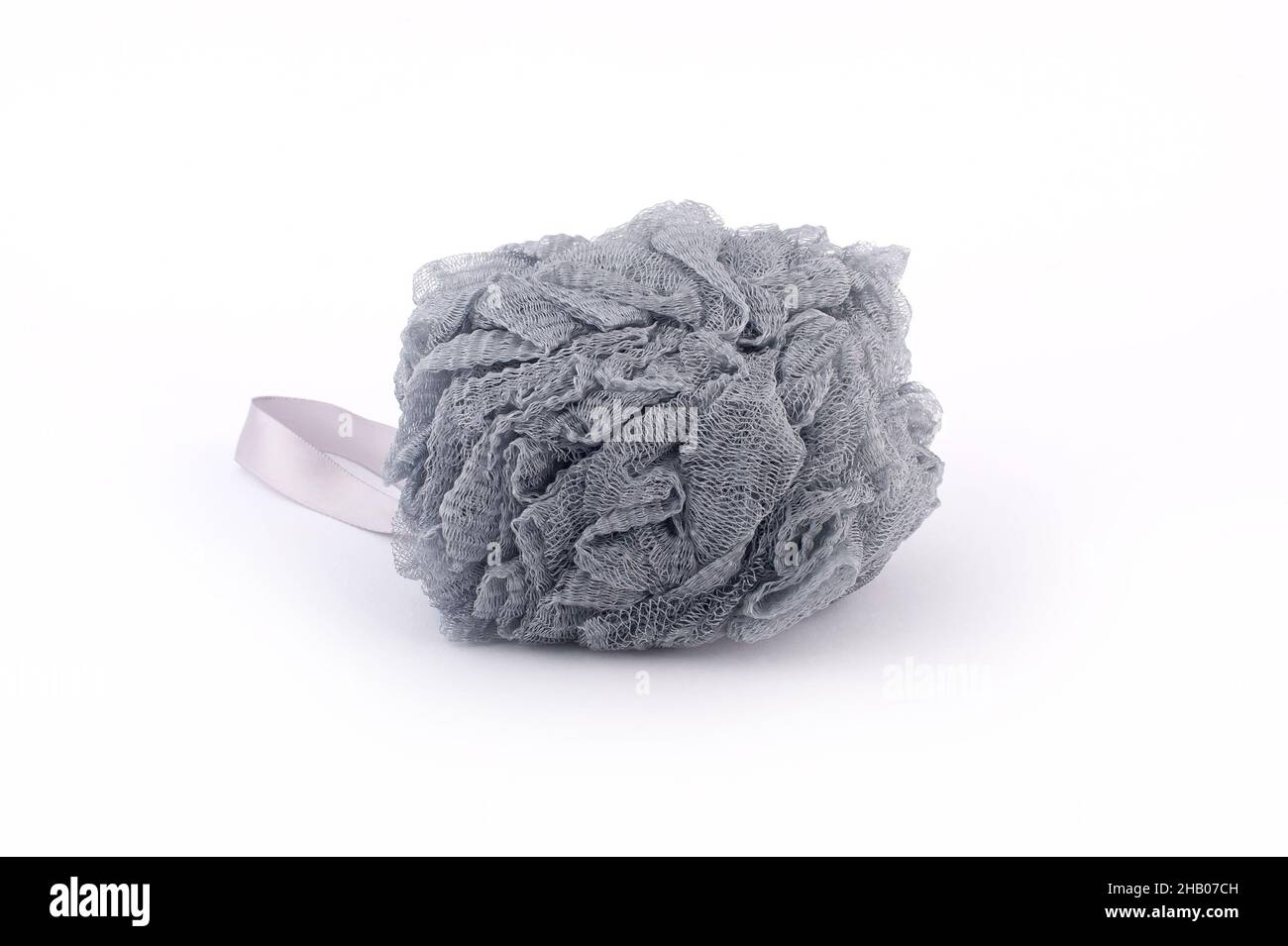 Soft grey bath puff or sponge isolated on white background. Studio ...