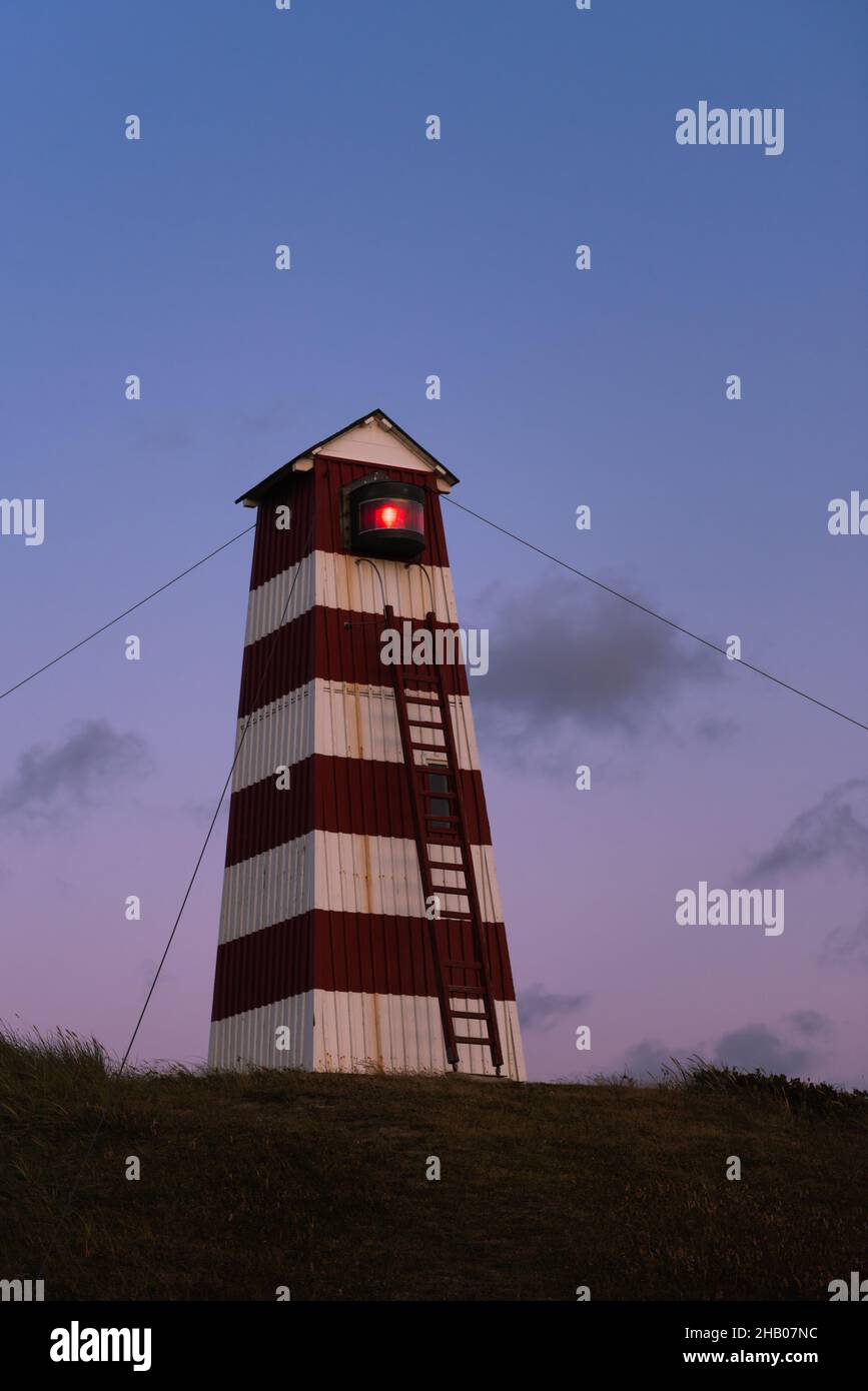 Old lighthouse in Denmark under a beautiful sunset Stock Photo - Alamy